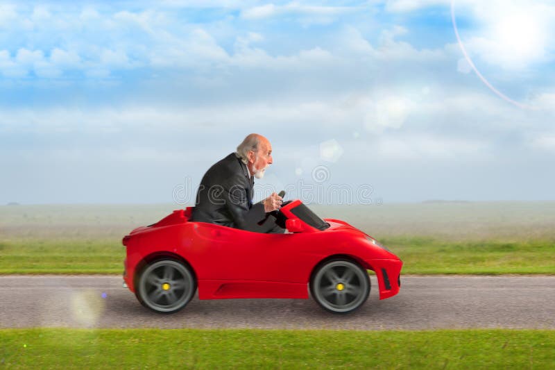 Senior Man Driving a Toy Racing Car Stock Image - Image of motion ...