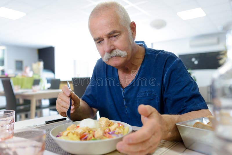 Senior Man Eating Lunch in Restaurant Stock Image - Image of adult ...