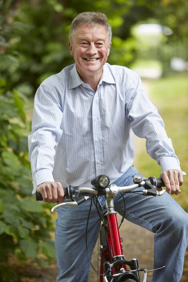 Senior Man Enjoying Cycle Ride Stock Photo - Image of cycling, sixties ...