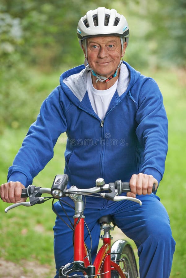 Senior Man Enjoying Cycle Ride in the Countryside Stock Photo - Image ...