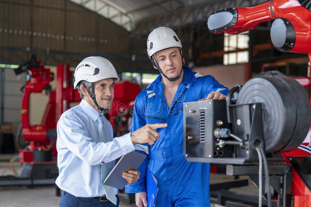 Senior Man Experienced Staff Using Tablet Computer is Advising an ...