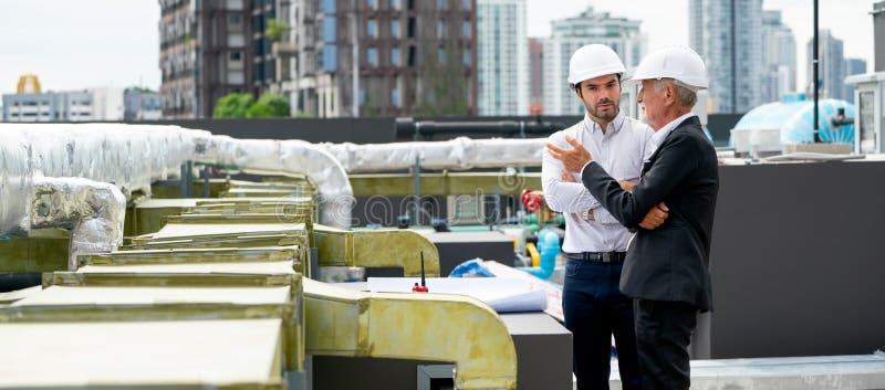 Senior Man Explain about Project To His Coworker As Engineer of ...