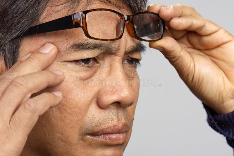 Senior Man Eye Strain after for Long Stretches at Computer. Stock Image ...