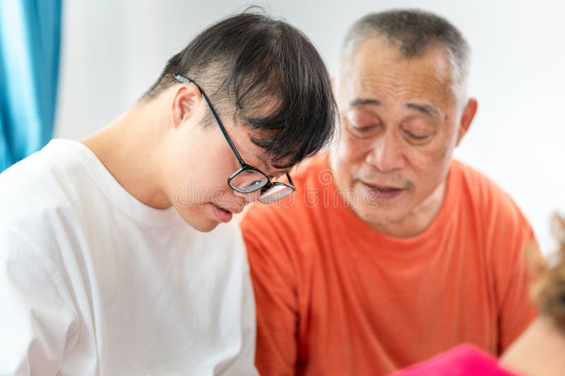 Senior Man and Grandchild Practice Math Skill, Interactive Math Game ...