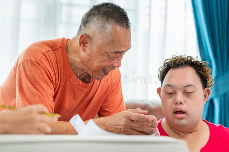 Senior Man and Grandchild Practice Math Skill, Interactive Math Game ...