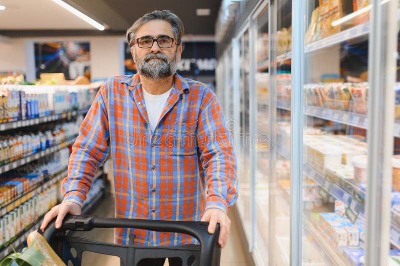 Senior Man at Grocery Store Products Stock Photo - Image of mature ...