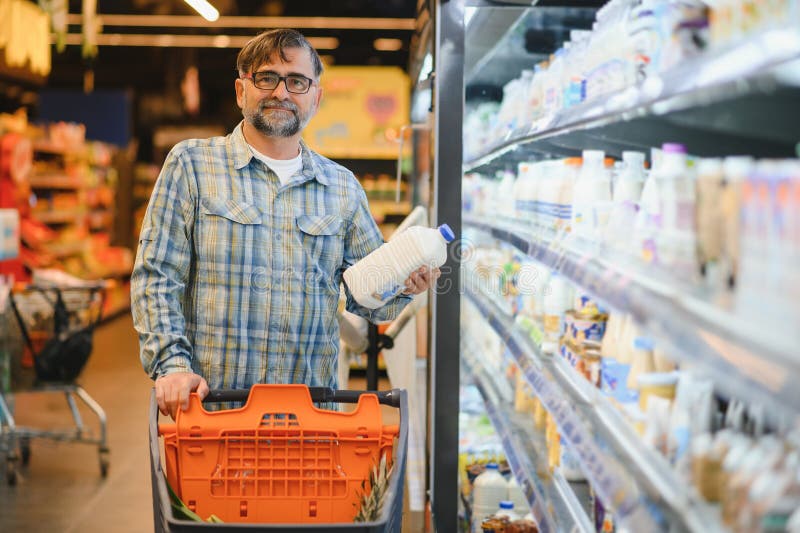 Senior Man at Grocery Store Products Stock Image - Image of food ...