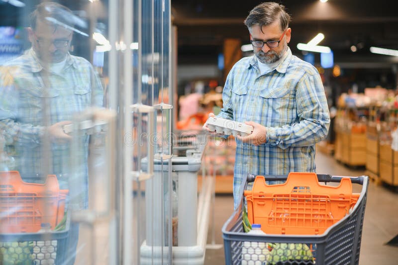 Senior Man at Grocery Store Products Stock Photo - Image of business ...