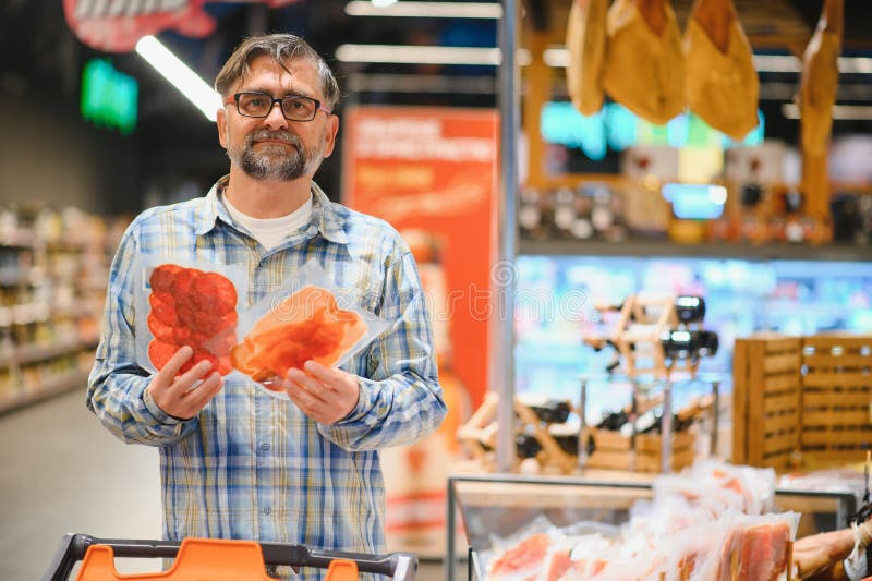 Bearded Man with Frozen Fish His Hands Stands at the Refrigerator in ...