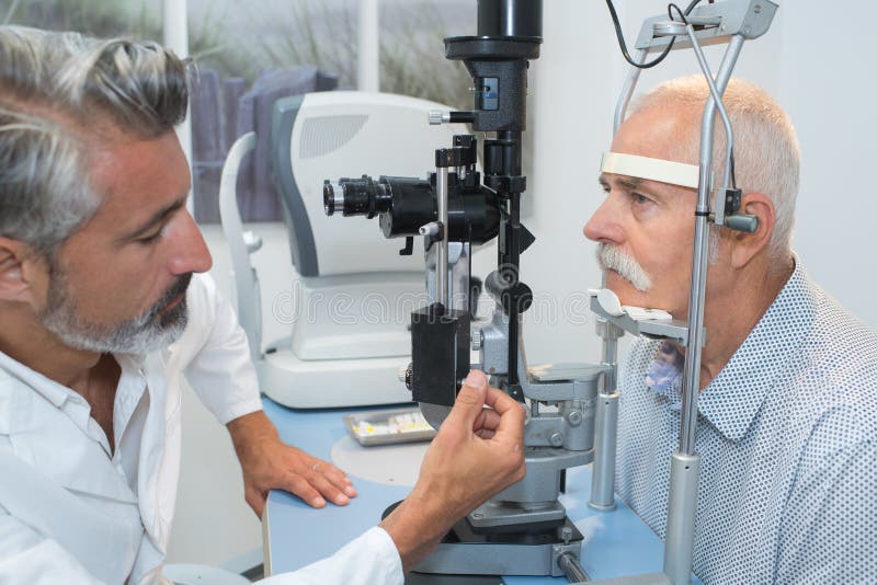 Senior man having eye test stock photo. Image of laboratory - 102662308