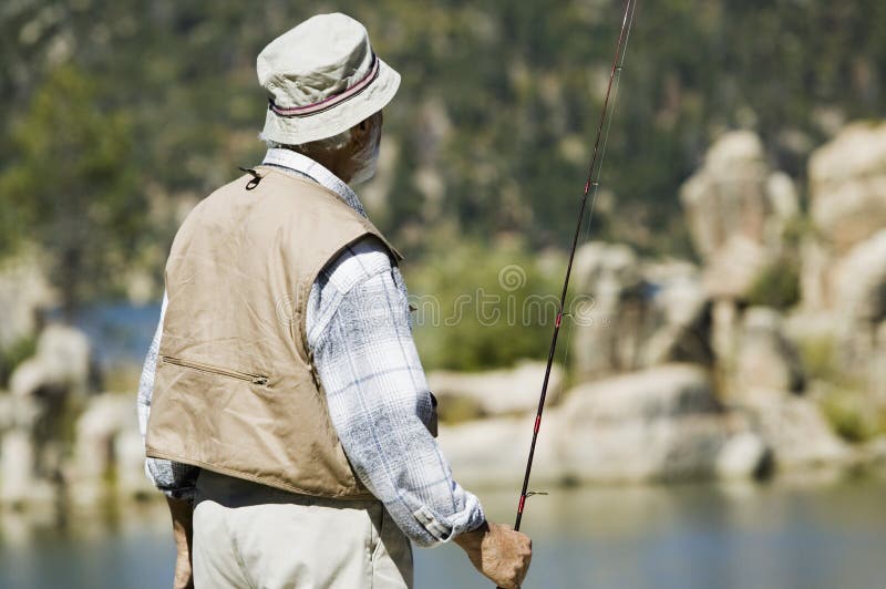 Senior Man Holding Fishing Rod Stock Image - Image of aged, adult: 29645551