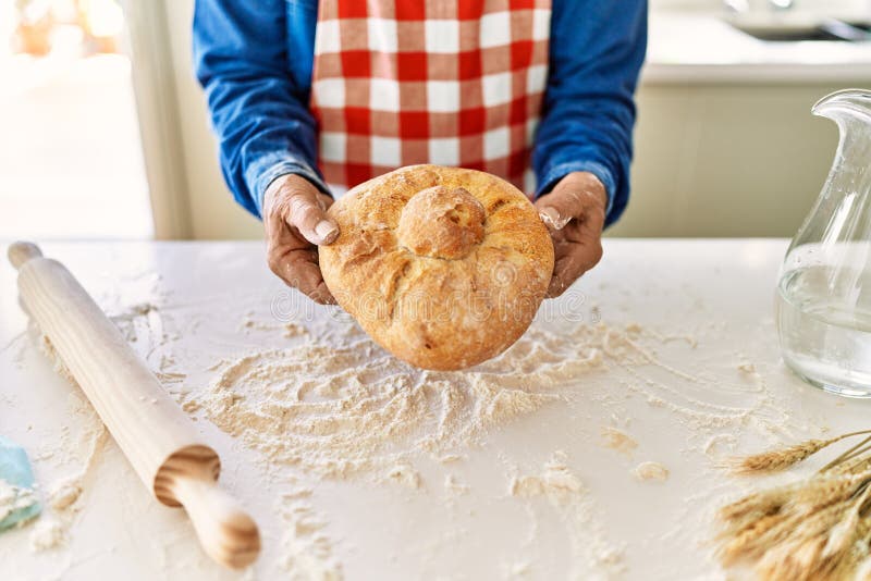 Senior Man Holding Homemade Bread at Kitchen Stock Photo - Image of ...