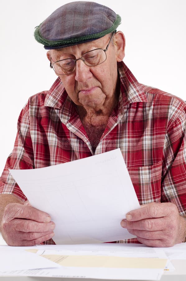 Senior man holding paper stock photo. Image of document - 11472930