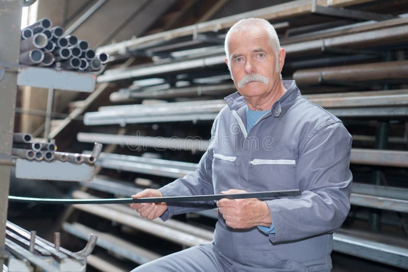 Senior Man Holding Sheet Metal Stock Image - Image of factory, metal ...