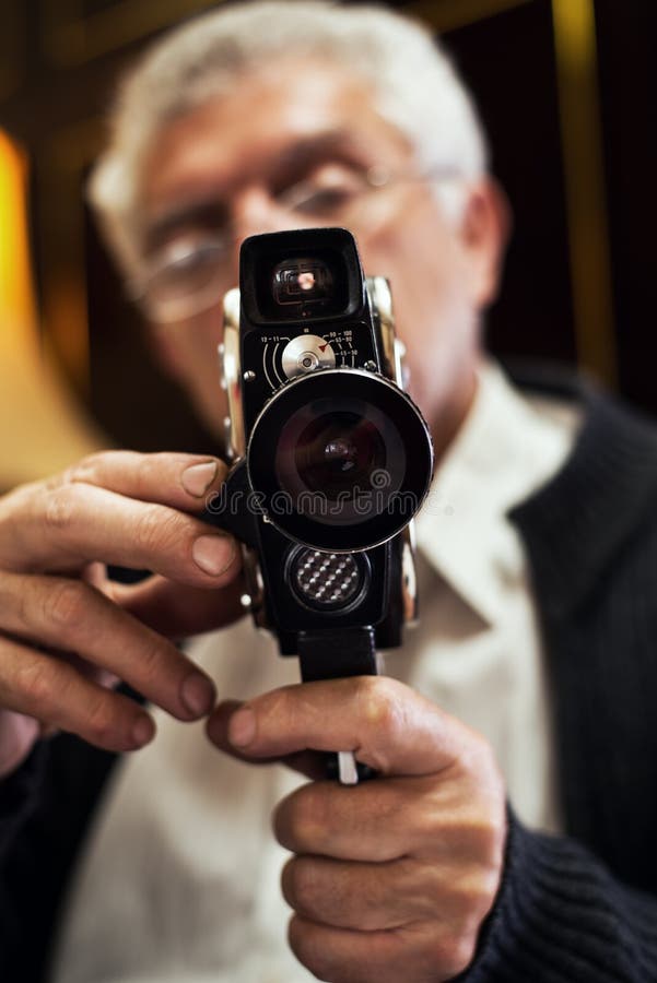 Man Holding Video Camera Stock Photos - Download 3,010 Royalty Free Photos
