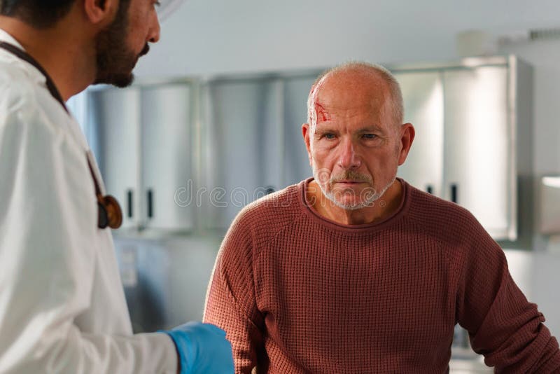 Senior Man with Injured Head in Hospital. Stock Image - Image of ...