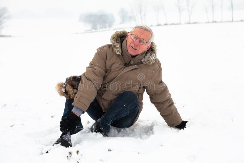Senior Man with Injured Leg on Snow Stock Image - Image of frozen, hurt ...