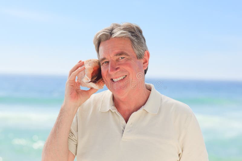 Man Listening To His Shell Stock Photos - Free & Royalty-Free Stock ...