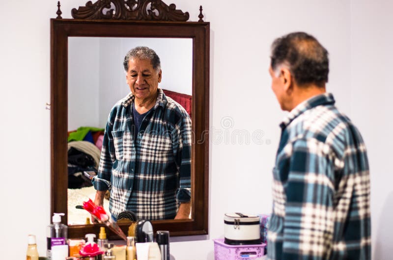 Man Looking At Himself In The Mirror Smiling Stock Photo - Image of ...