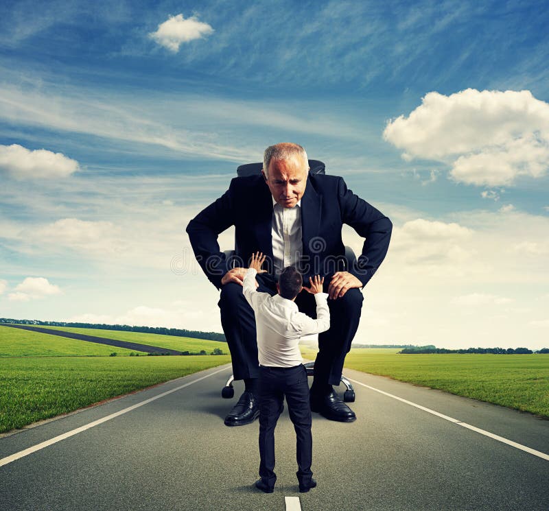 Senior Man Looking at Scared Small Man Stock Photo - Image of employer ...