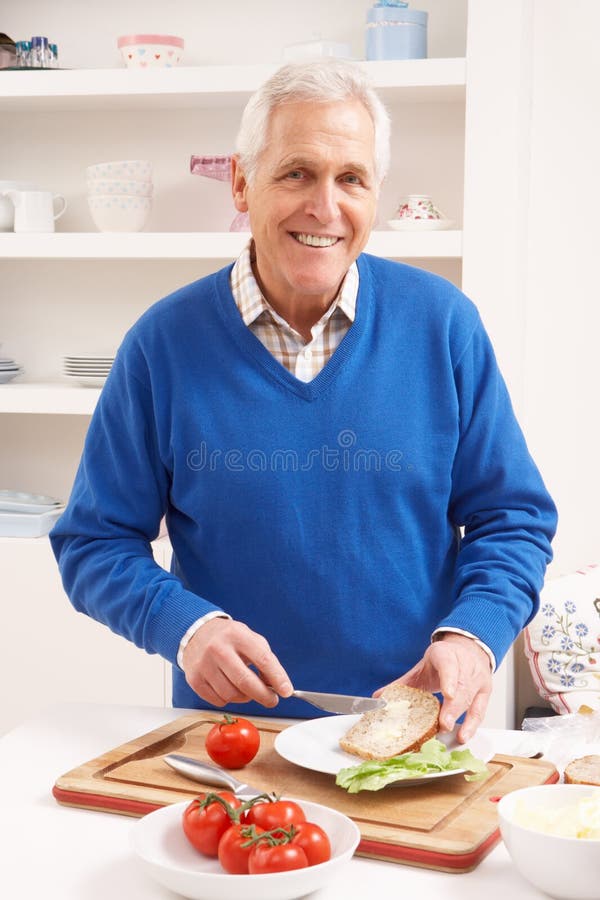 Senior Man Making Sandwich in Kitchen Stock Image - Image of older ...