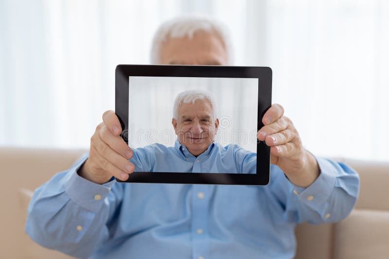 Senior Woman Using Touch Pad Device Stock Photo - Image of multitouch ...