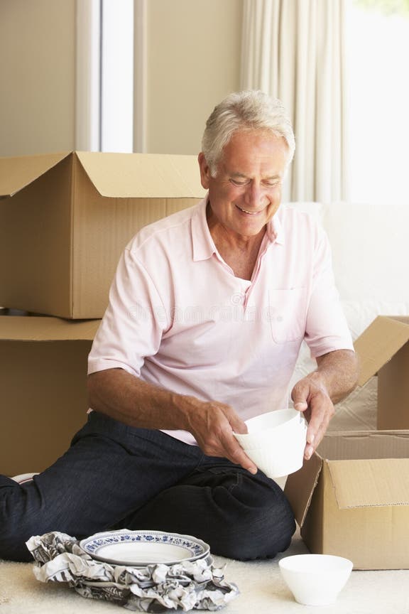 Senior Man Moving Home and Packing Boxes Stock Photo - Image of ...