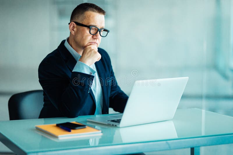Senior Man in Modern Office Working on Laptop Computer Stock Image ...