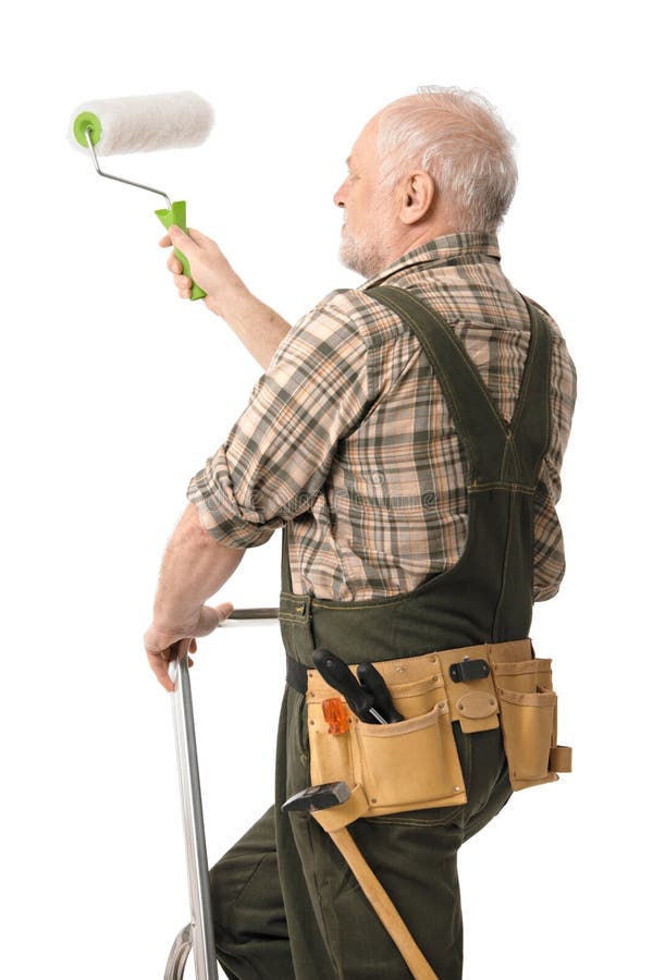 Senior man painting wall stock image. Image of contractor - 16276739