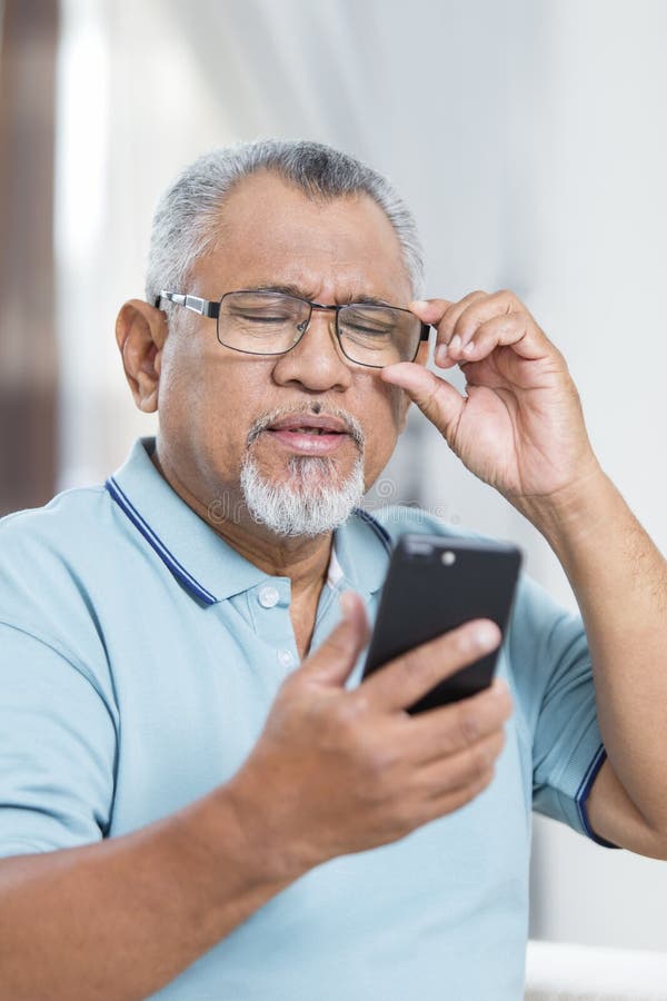 Senior man on the phone stock photo. Image of holding - 183356298