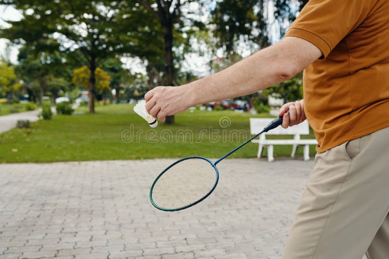 Senior Man Playing Badminton Outdoors Stock Photo - Image of play ...