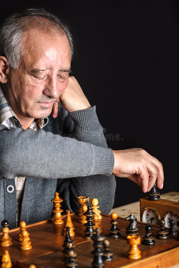 Senior Man Thinking about His Next Move in a Game of Chess Stock Image ...