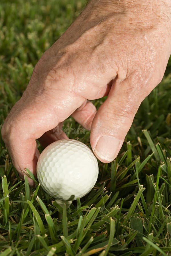 Senior man playing golf stock photo. Image of home, hand - 62808912