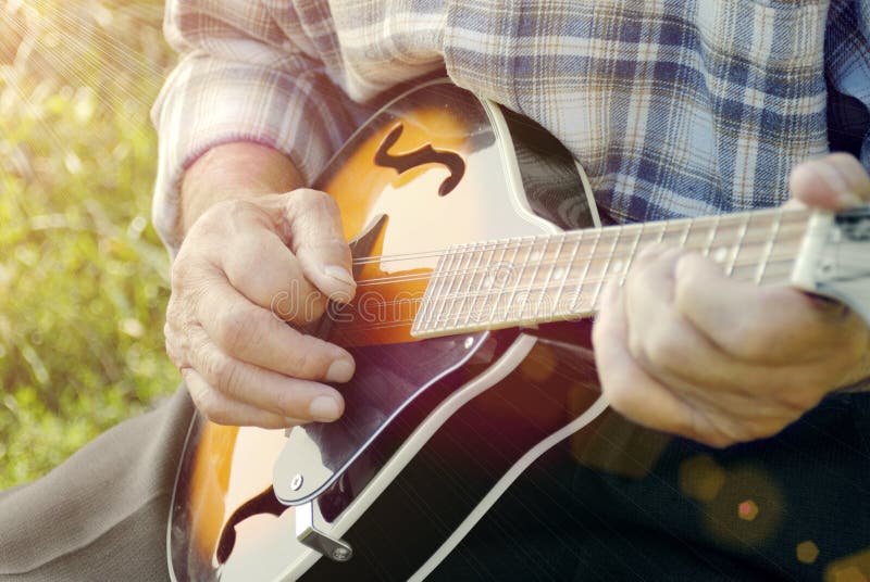 Man playing mandolin stock photo. Image of looking, lifestyles - 36376134