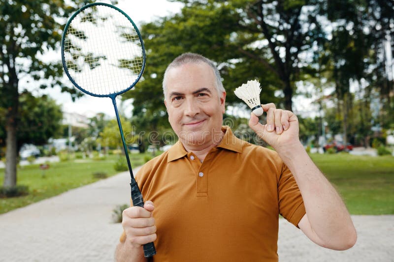 Senior Man with Racket and Shuttlecock Stock Photo - Image of sport ...