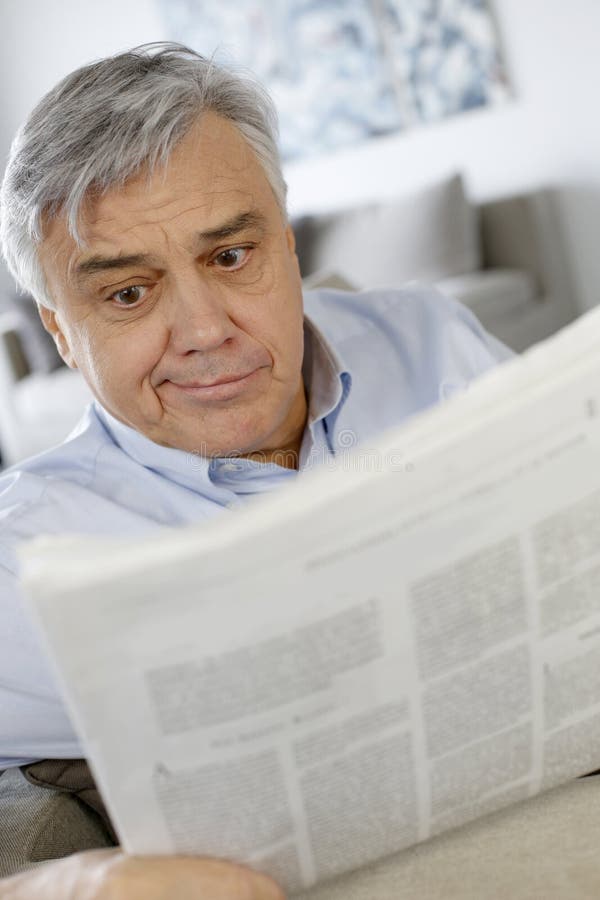 Senior Man Reading Newspaper Stock Photo - Image of living, portrait ...