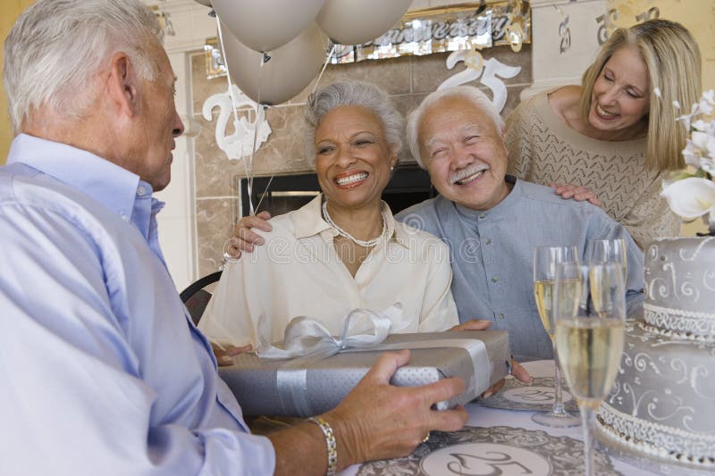 Senior Man Receiving Gift from Friends Stock Image - Image of enjoyment ...
