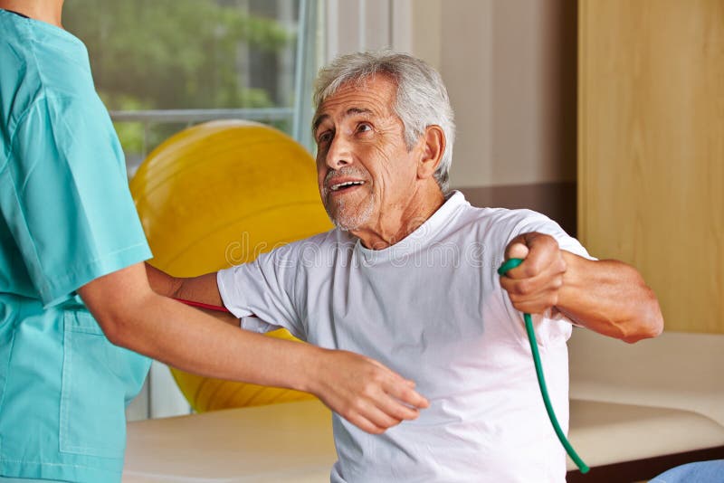 Senior Man at Rehab with Nurse Stock Photo - Image of rehabilitation ...