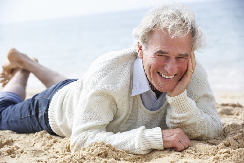 Senior Man Relaxing on Beach Stock Photo - Image of caucasian ...