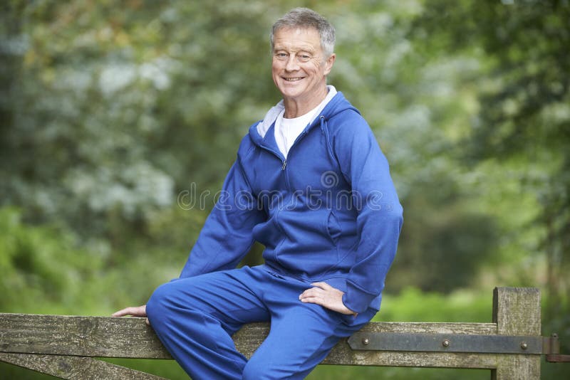Senior Man Resting Whilst Exercising in Countryside Stock Image - Image ...