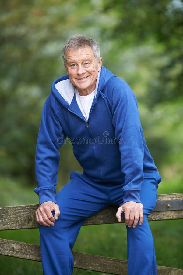 Senior Man Resting Whilst Exercising in Countryside Stock Photo - Image ...