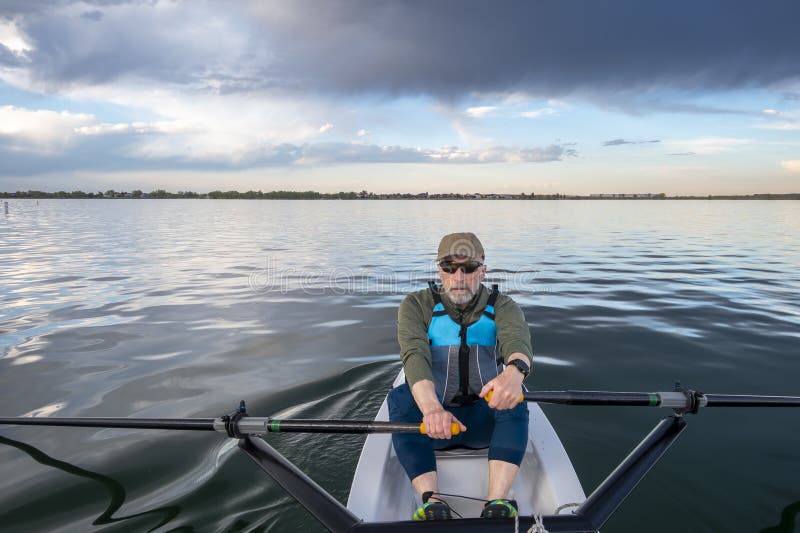 Senior Man in a Rowing Shell on a Lake in Colorado Stock Photo - Image ...