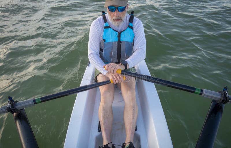 Senior Man in a Rowing Shell on a Lake in Colorado Stock Photo - Image ...