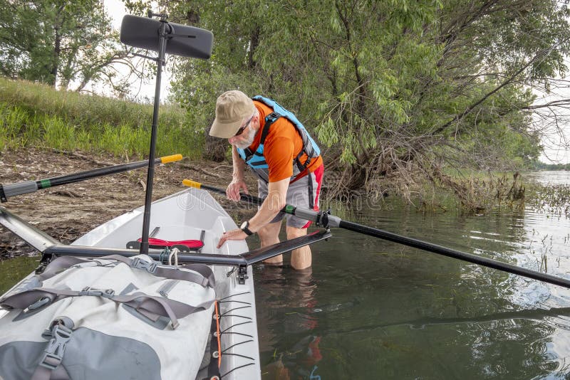 Senior Man with a Rowing Shell on a Shore of a Lake Stock Image - Image ...