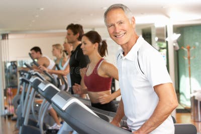 Senior Man on Running Machine Stock Photo - Image of sixties, older ...