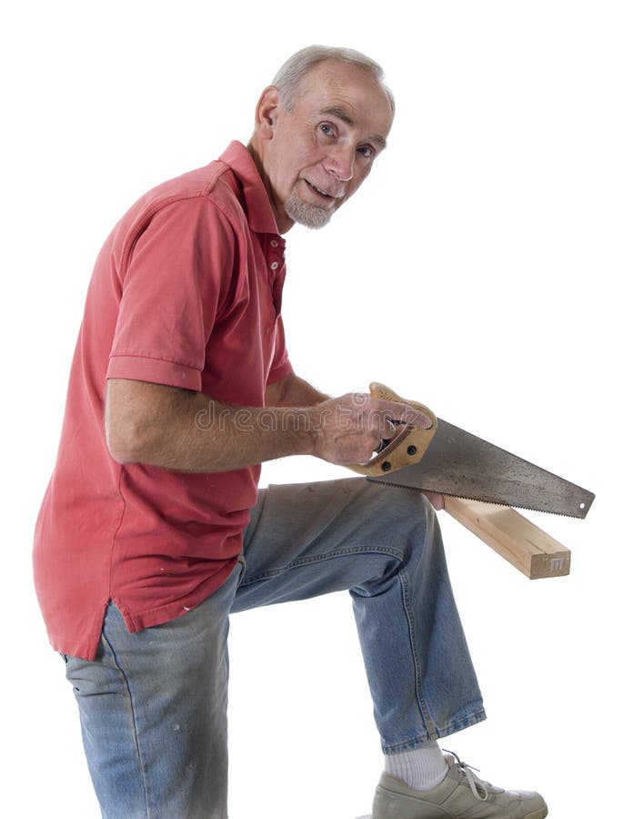 Senior man sawing wood stock photo. Image of plank, tools - 8802982
