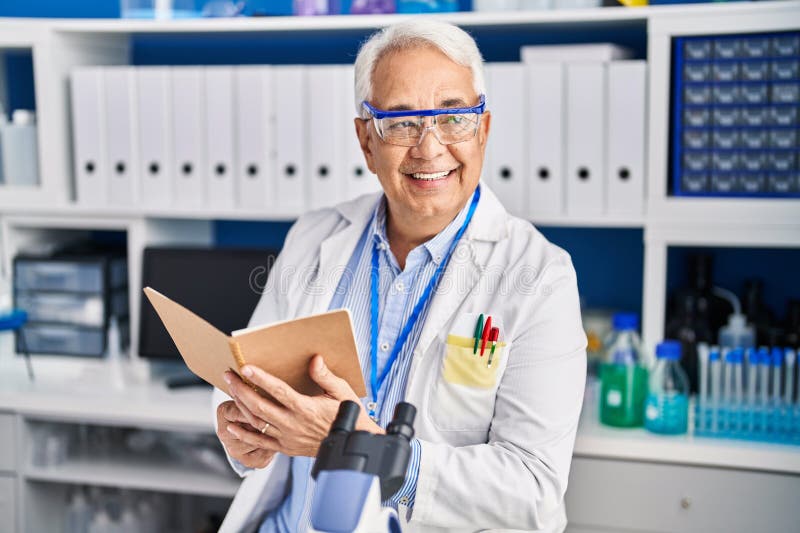 Senior Man Scientist Reading Book at Laboratory Stock Image - Image of ...