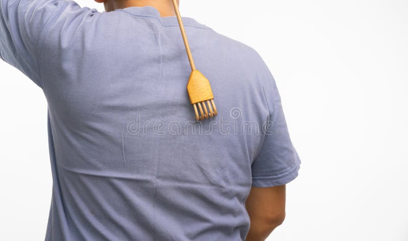 Senior Man Scratching His Back with a Back Scratcher Stock Photo ...