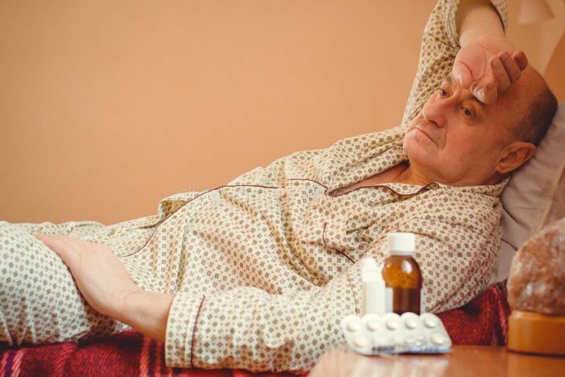 Senior Man Sick Bed Health Concept Of Old People Life Stock Image