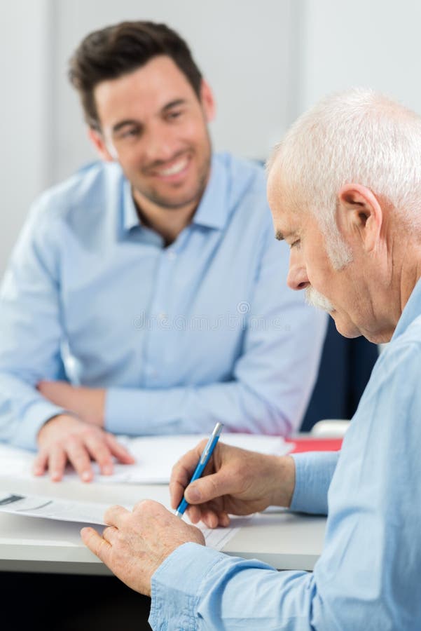 Senior Man Signing Document Stock Photo - Image of contemporary, client ...